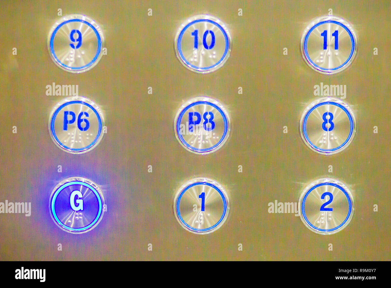 Elevator buttons pressed G down to ground floor. Elevator button ...