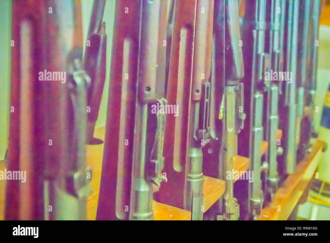 Old military rifle in the public museum. A rifle is a firearm designed ...