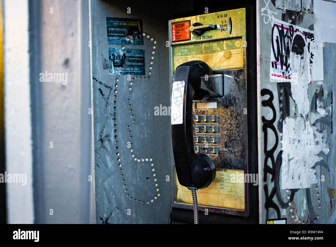 Old retro pay phone box on the street coin Stock Photo - Alamy