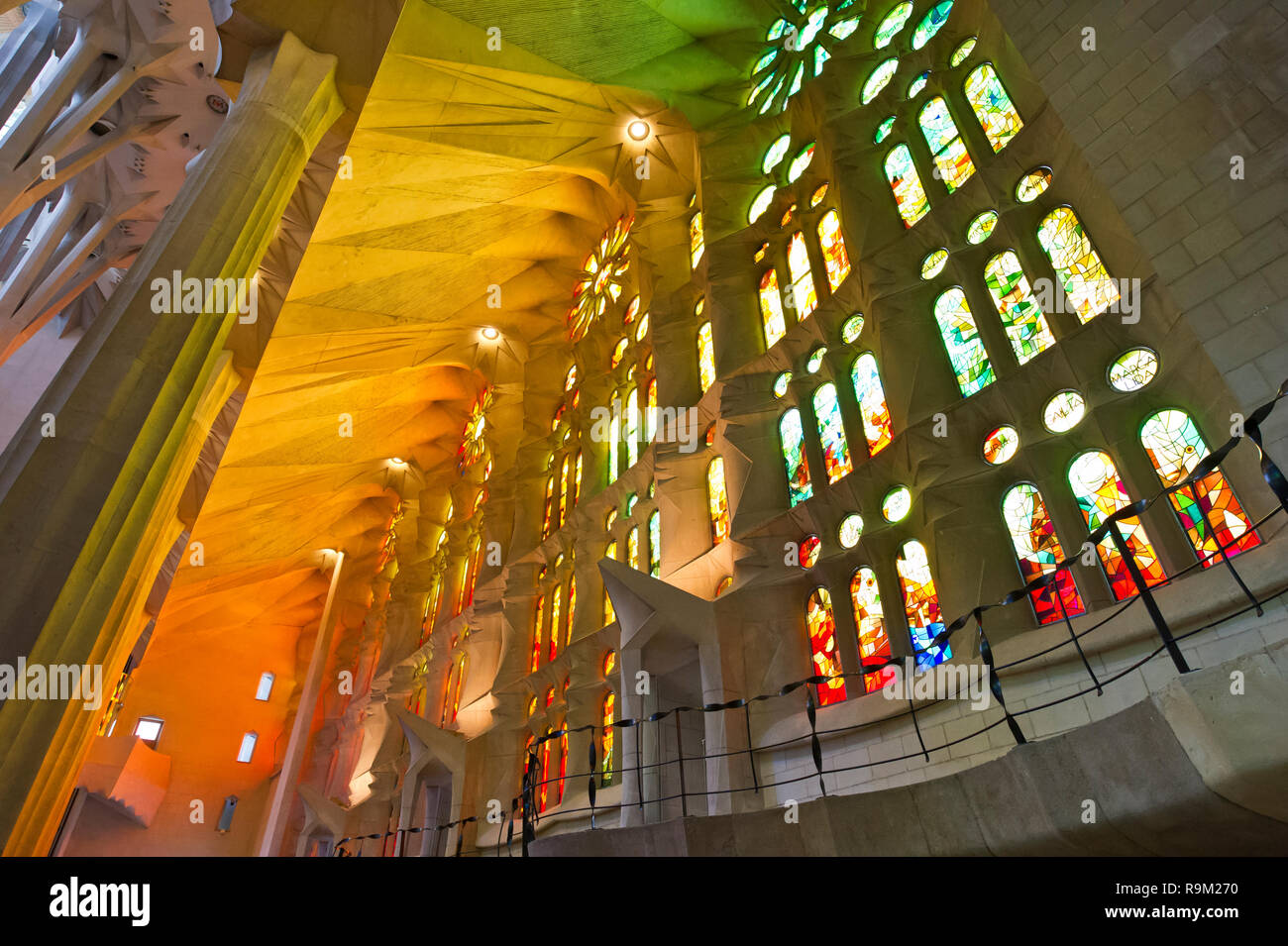 Bright rays of light shining through the stained glass windows inside ...