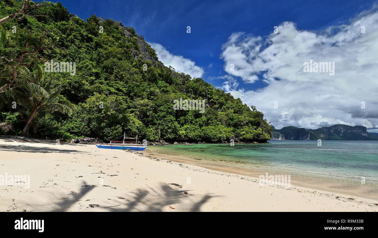 Cudugnon Point Cave beach in Palawan mainland with stranded old ...