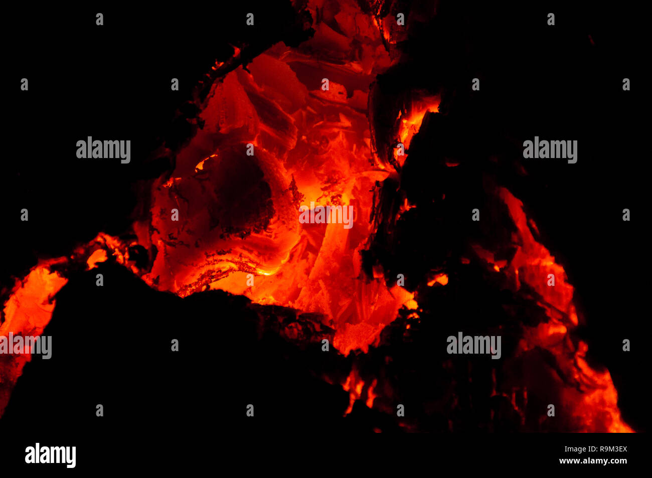 Live hot burning coals of firewood in fireplace Stock Photo - Alamy