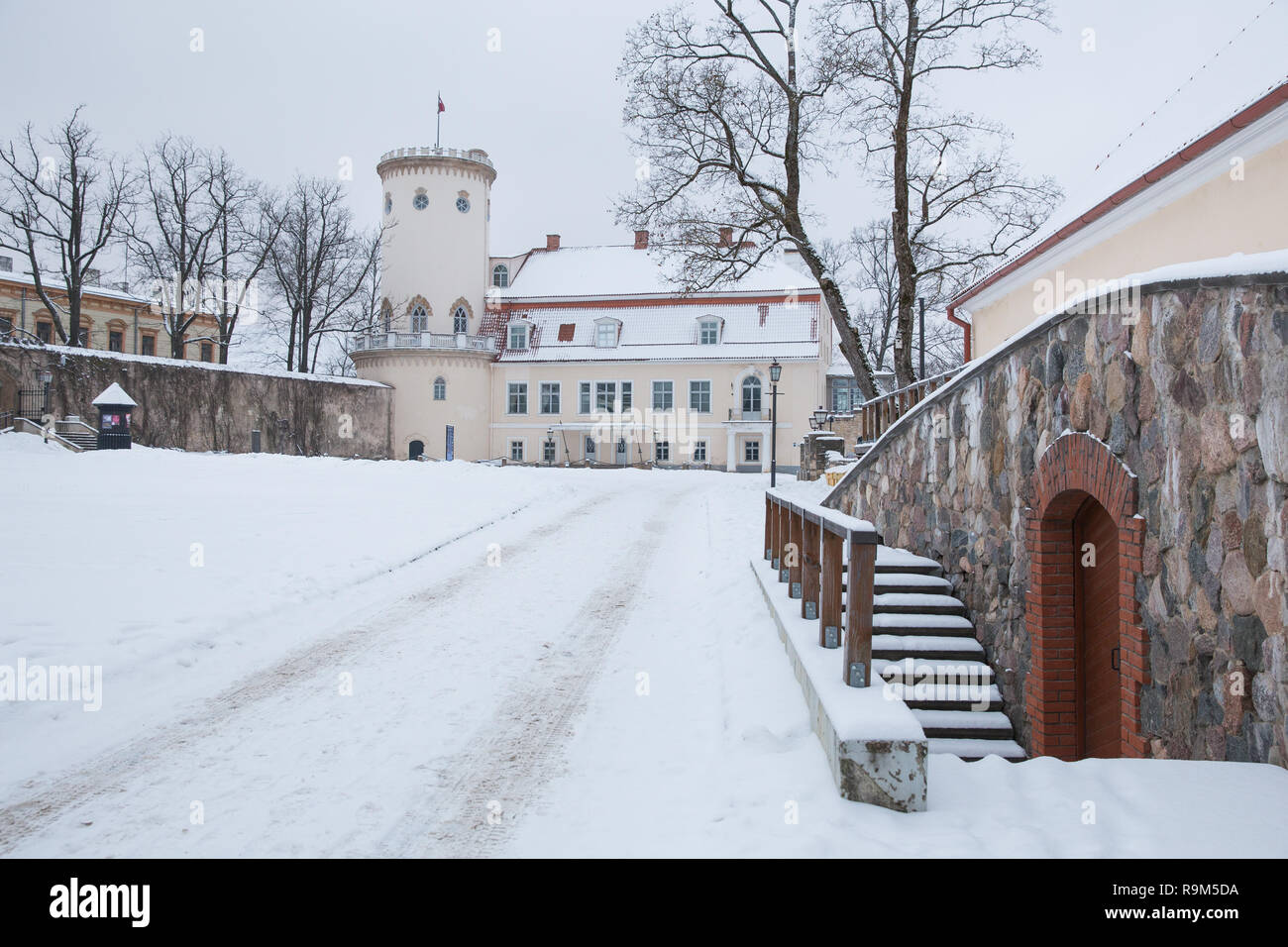 City Cesis, Latvia. Old town castle, street and urban view. Winter and ...