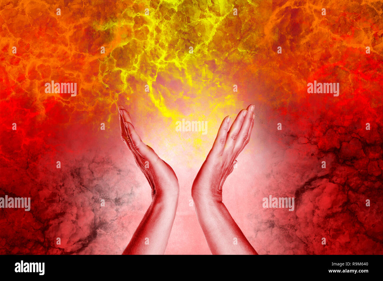 Open hands with with full of energy. Red chakra concept Stock Photo - Alamy