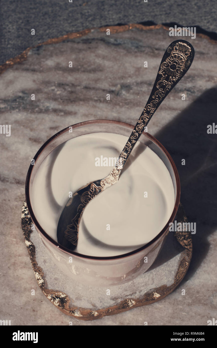 dairy and rustic farm food styled concept - fresh creamy white yogurt ...