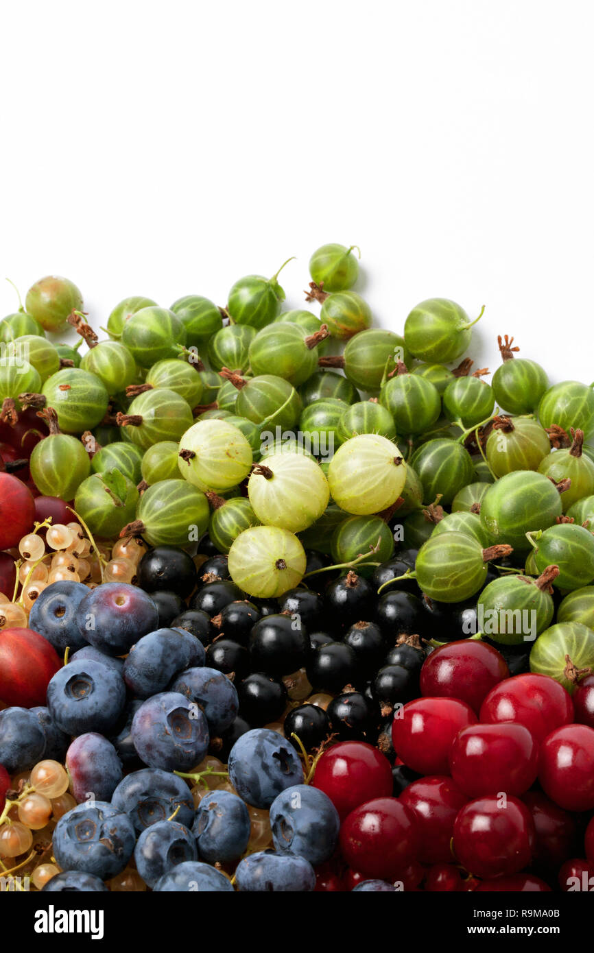 Different berries isolated on the white background Stock Photo - Alamy