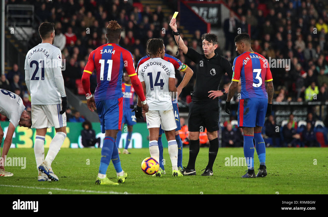 Cardiff City's Victor Camarasa (left) is shown a yellow card by Match ...