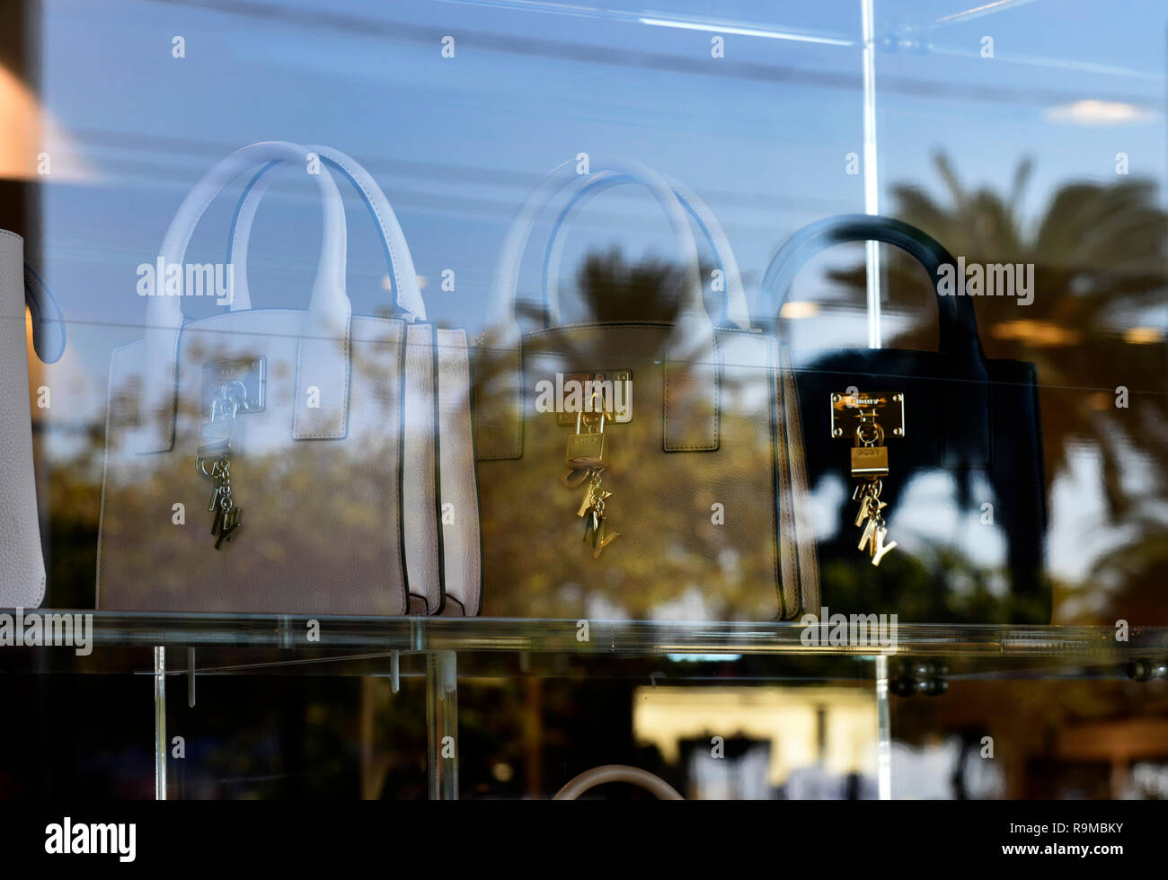 handbags in shop window Stock Photo - Alamy