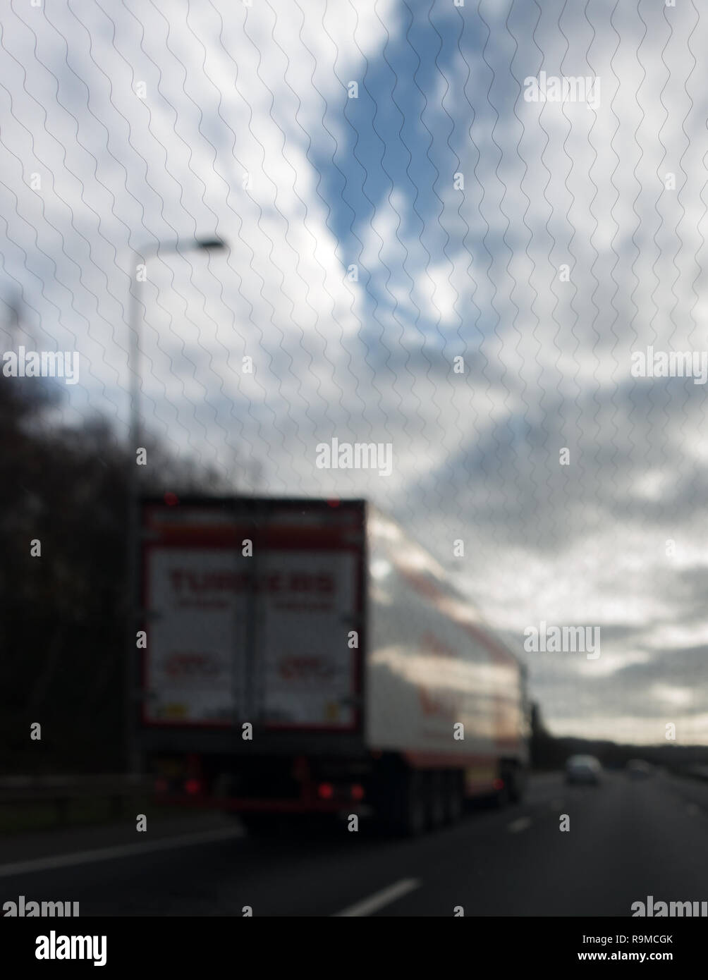 Close up of the wavy lines of a heated front windscreen from inside the ...