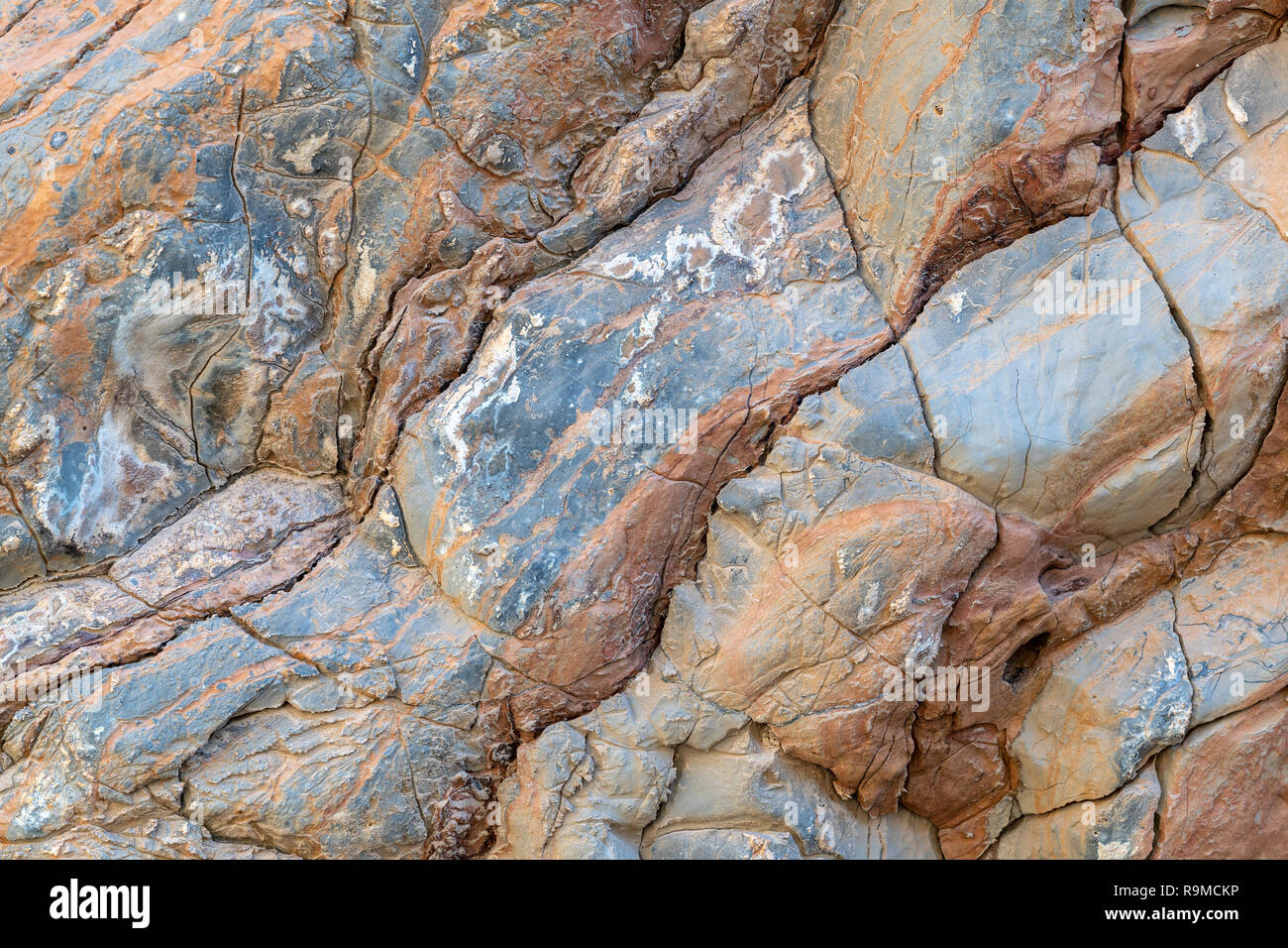 The rocky texture closeup of the Titus Canyon wall in Death Valley ...