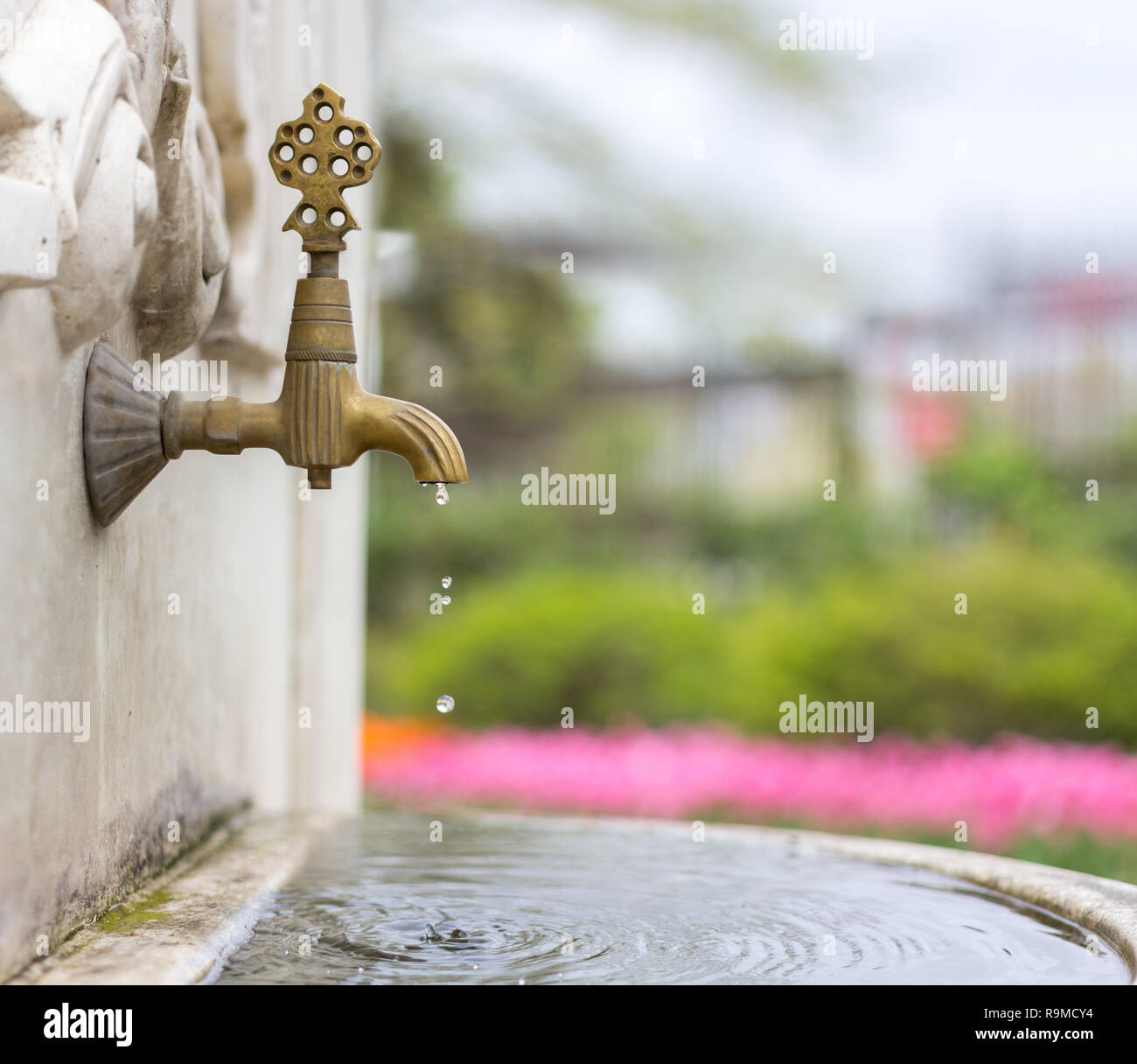 Water fountain with brass tap hi-res stock photography and images - Alamy