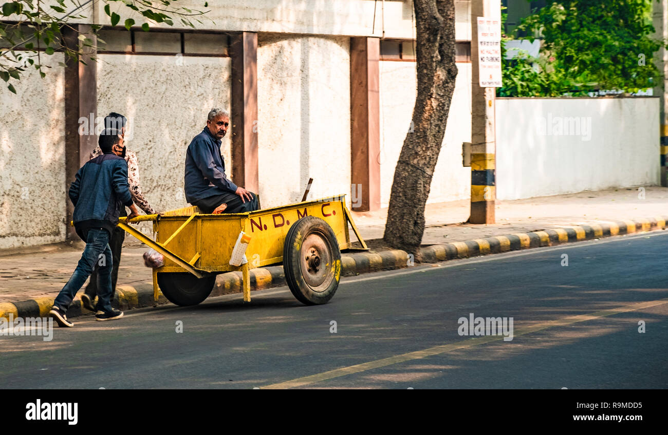 Municipality workers heading home Stock Photo - Alamy