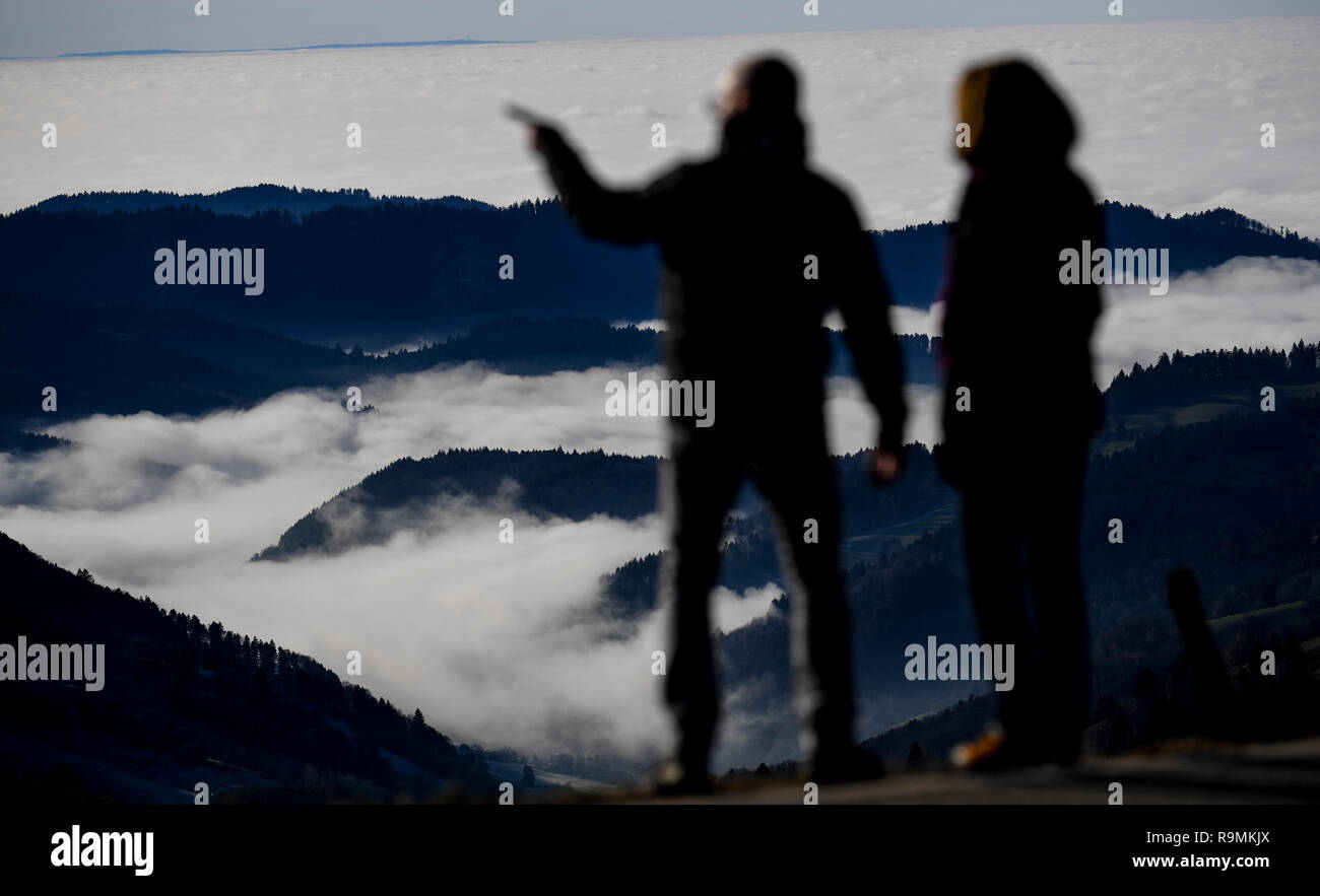 Hofsgrund, Germany. 26th Dec, 2018. A couple stands on the Schauinslan ...