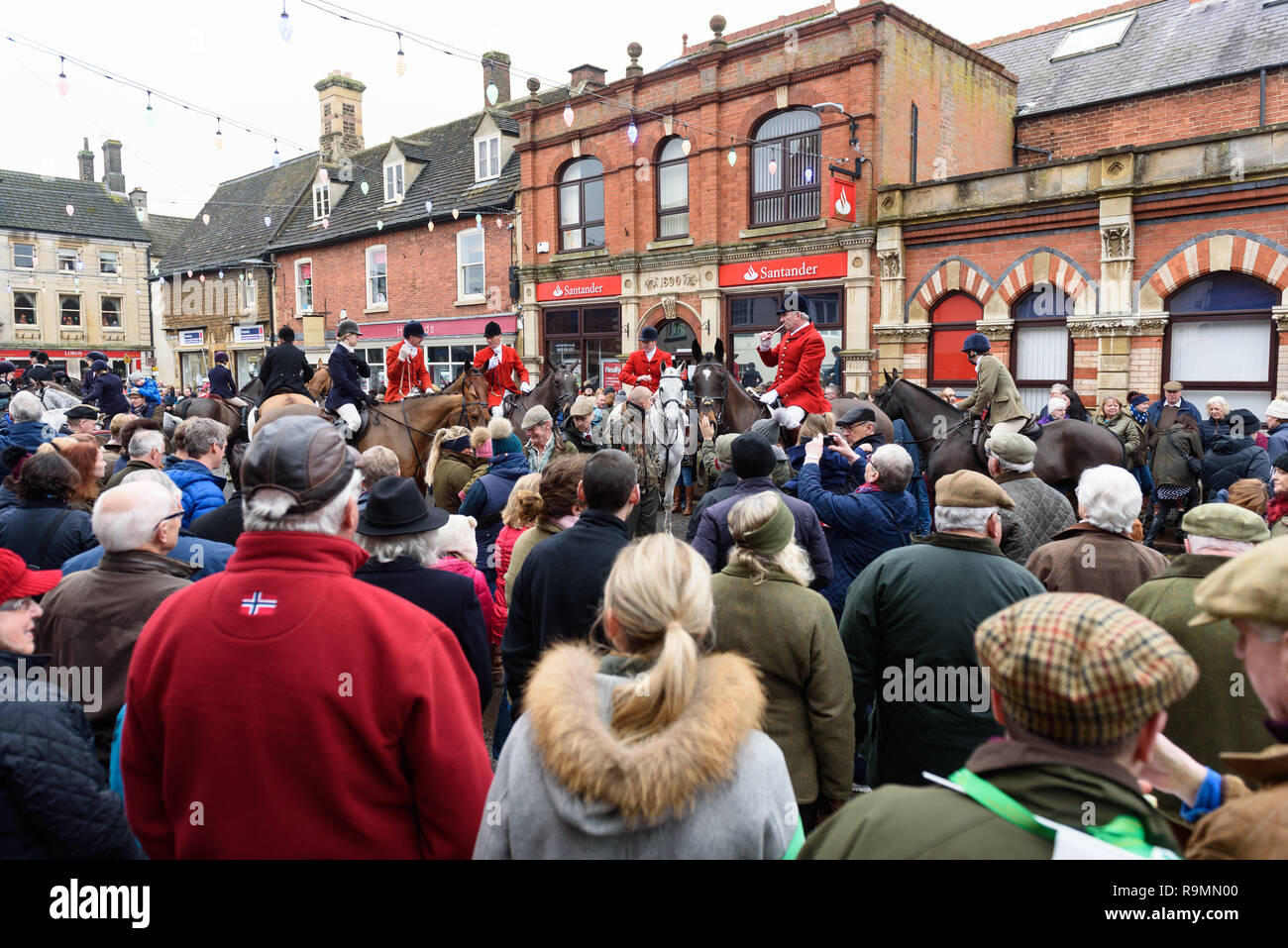 Crowds gather in the Market Square in Oakham. The Cottesmore Hunt ...