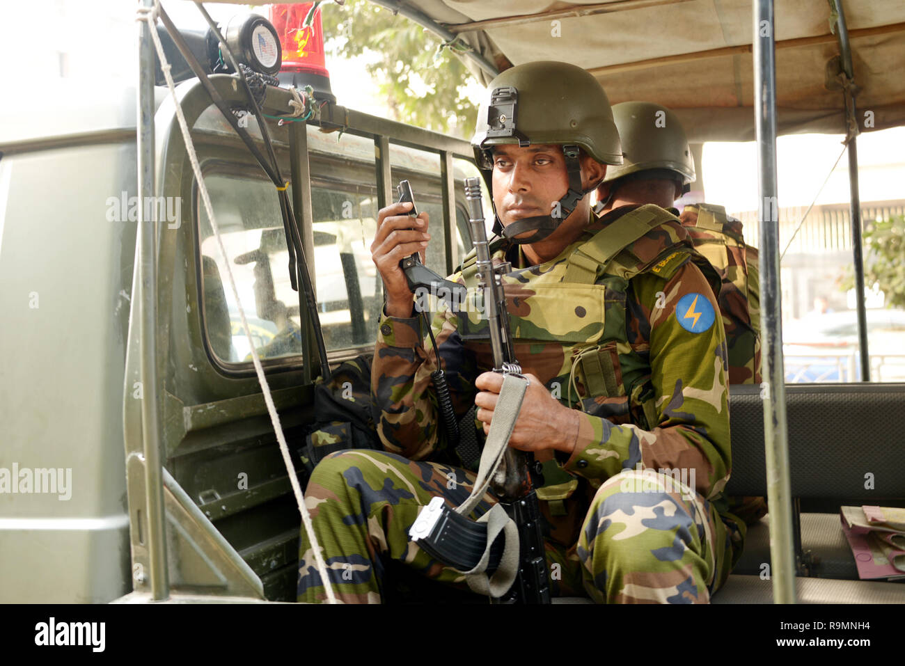Dhaka, Bangladesh. 26th Dec, 2018. Army soldiers patrol a street in ...