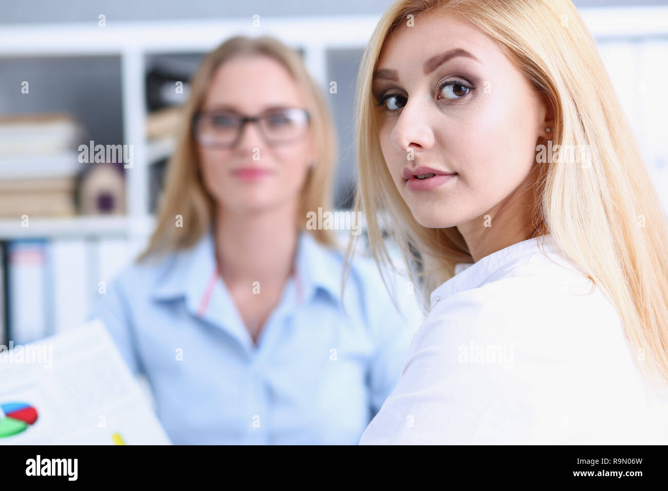 Beautiful woman portrait at workplace Stock Photo - Alamy