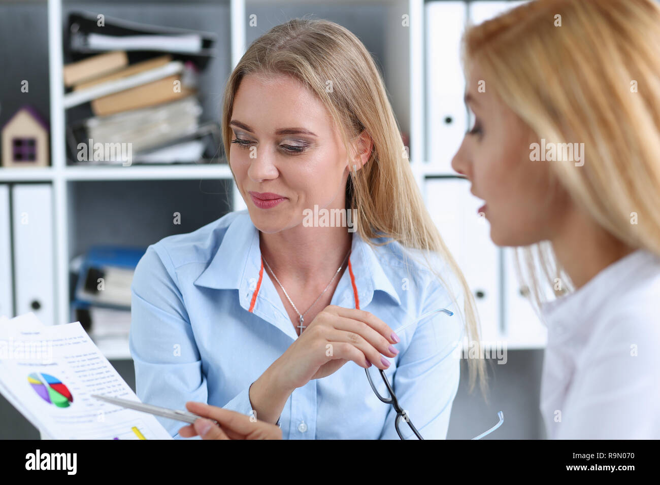 Beautiful woman portrait at workplace Stock Photo - Alamy