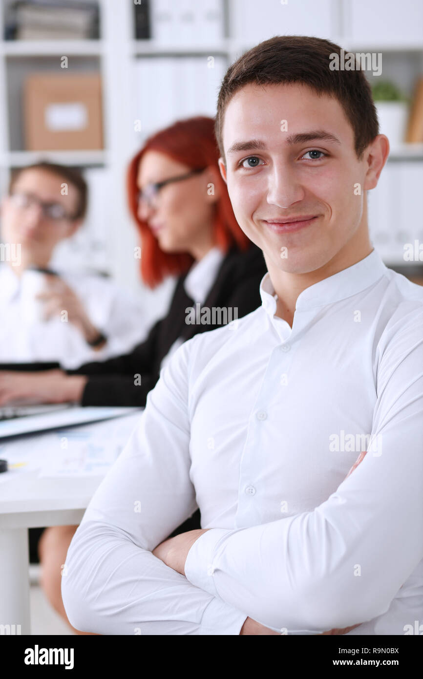 Beautiful smiling business man at workplace Stock Photo - Alamy