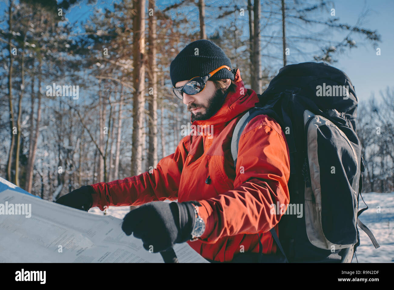 Male hiker checks map hi-res stock photography and images - Alamy