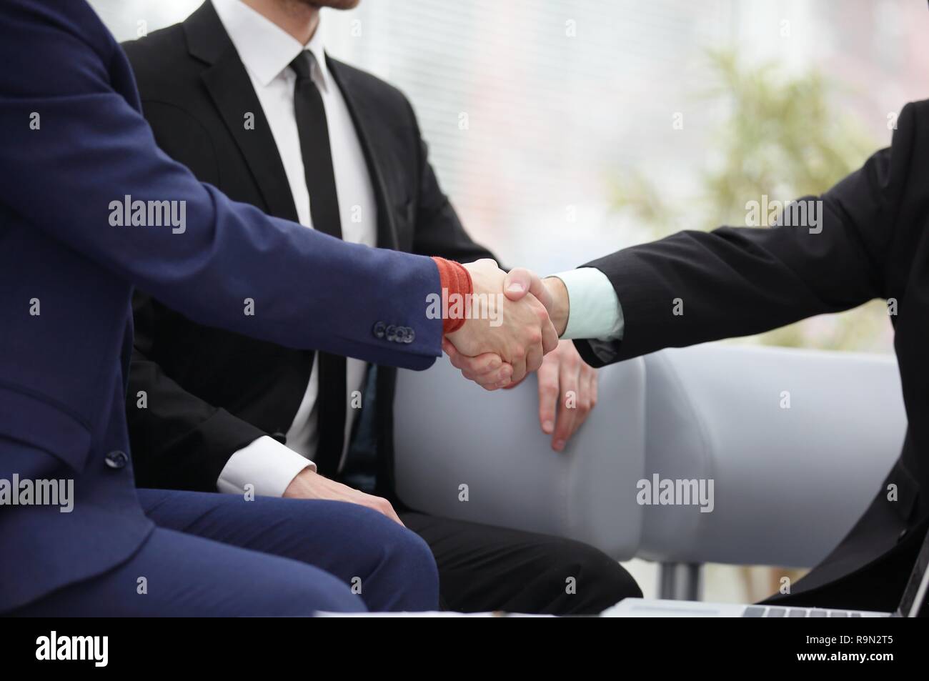 close up.handshake between Manager and client as a sign of cooperation ...