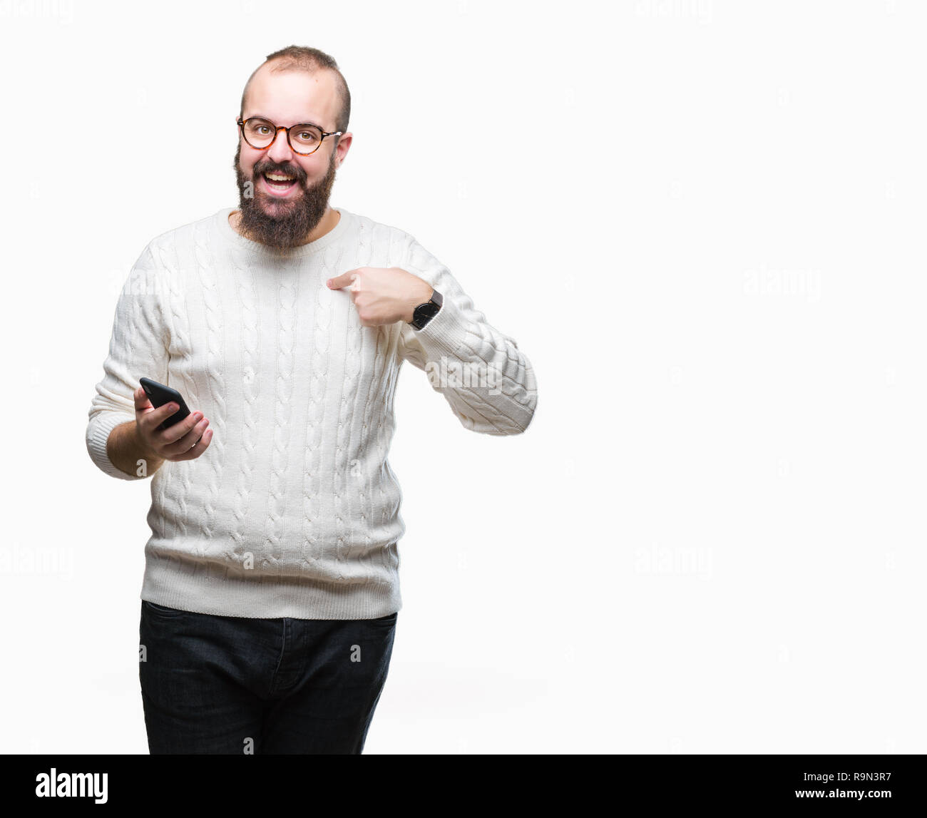Young caucasian hipster man texting sending message using smartphone ...