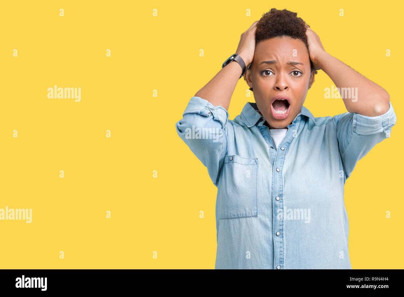 Young beautiful african american woman over isolated background Crazy ...