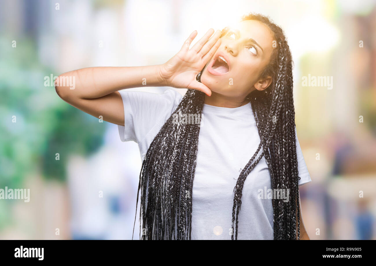 Young braided hair african american girl over isolated background ...