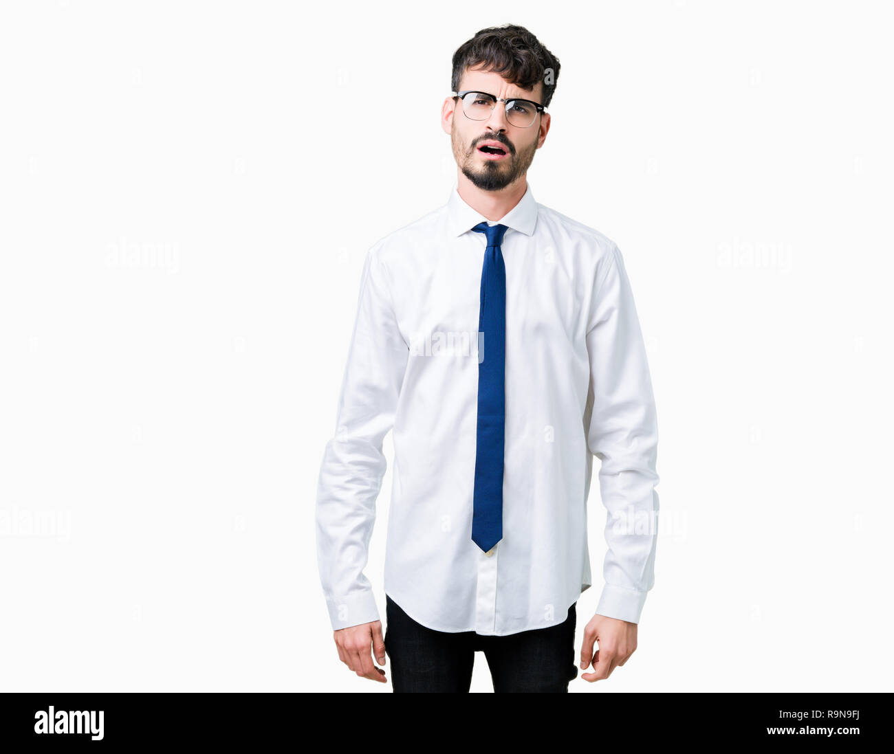 Young handsome business man wearing glasses over isolated background In ...