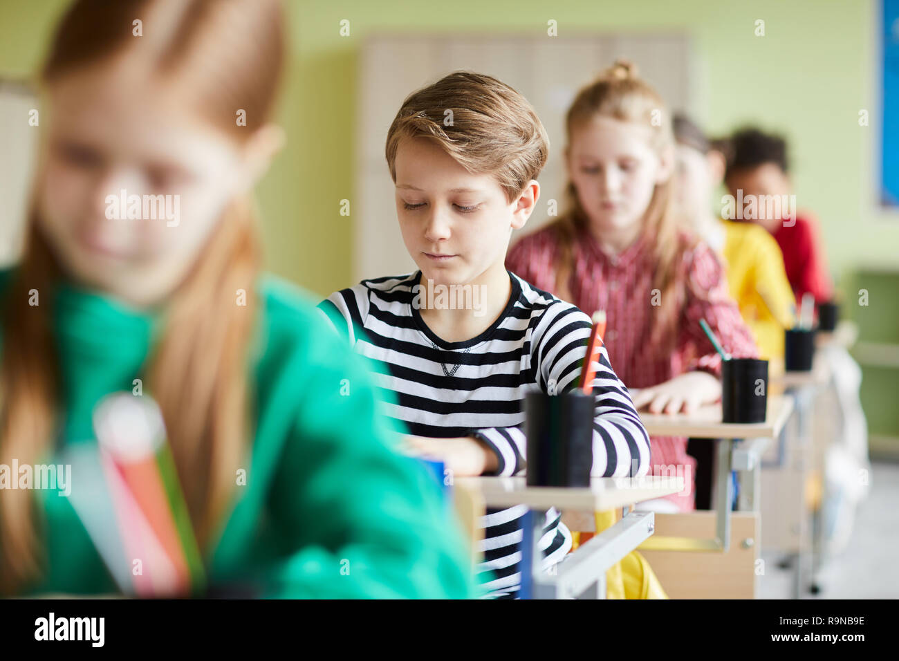 Difficult exam in elementary school Stock Photo - Alamy
