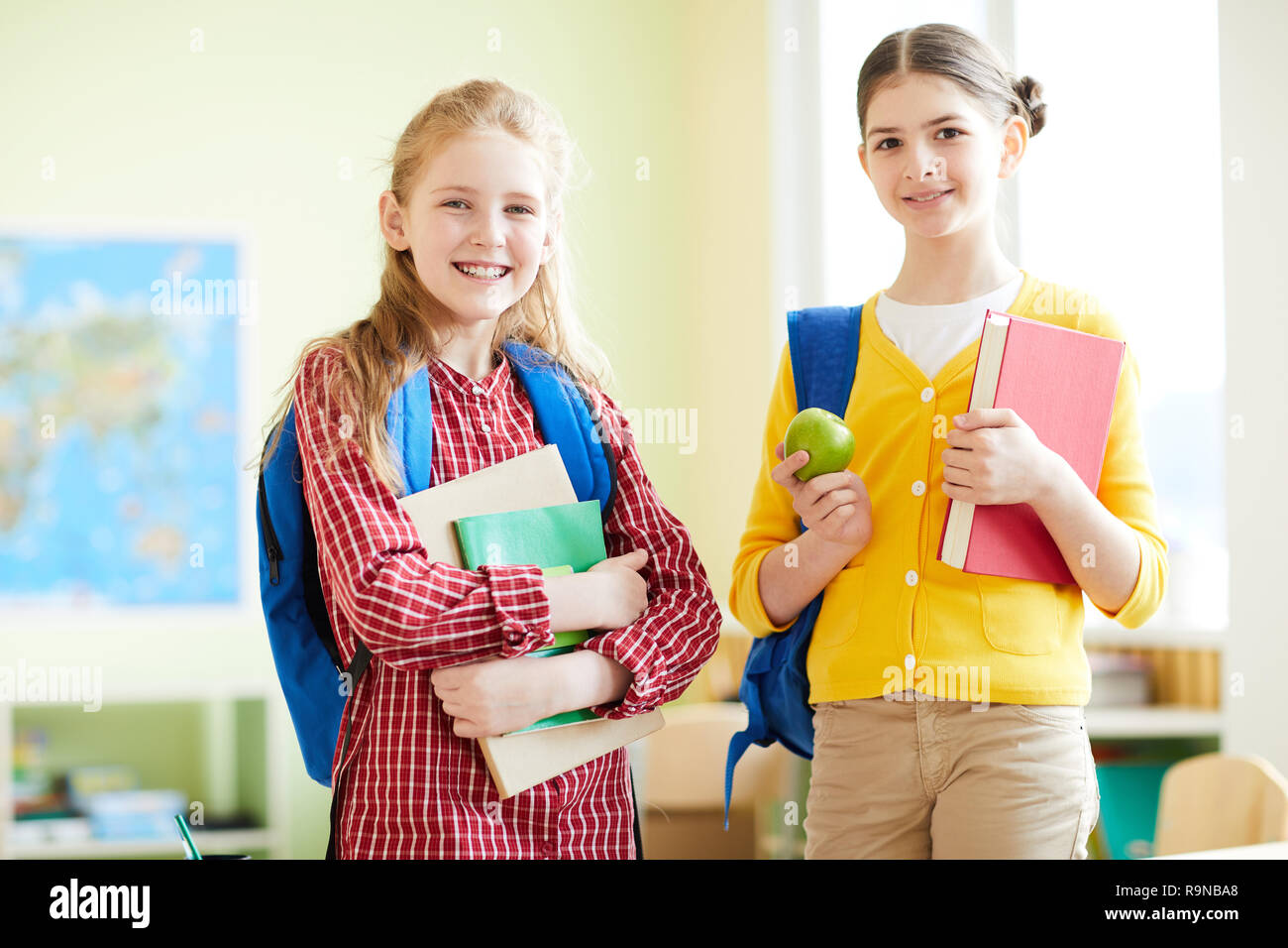 Positive school friends at break Stock Photo - Alamy