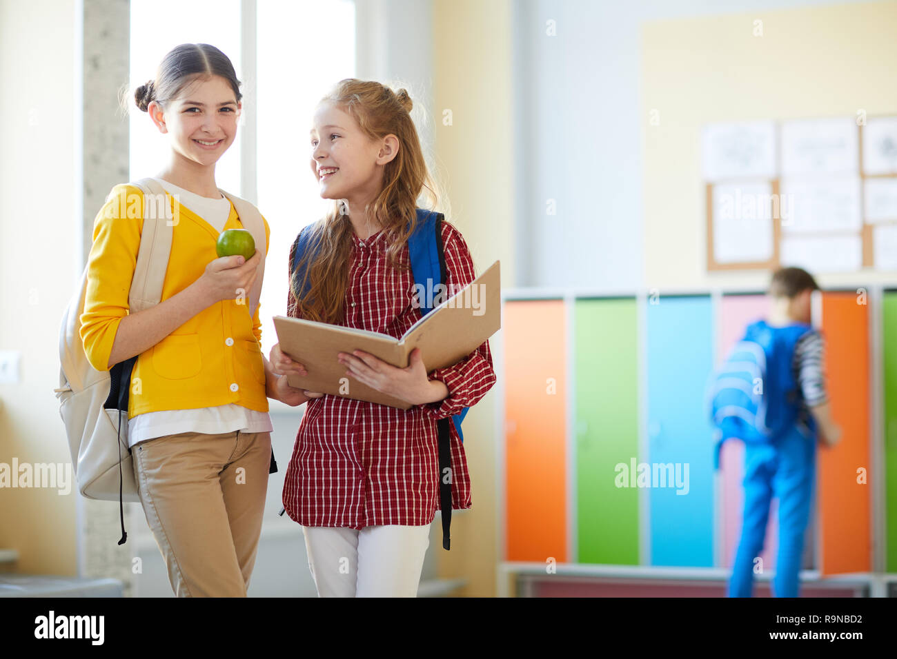Positive students talking homework hi-res stock photography and images ...