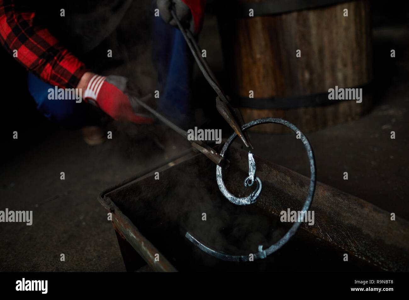 Getting twisted bar out of water Stock Photo - Alamy