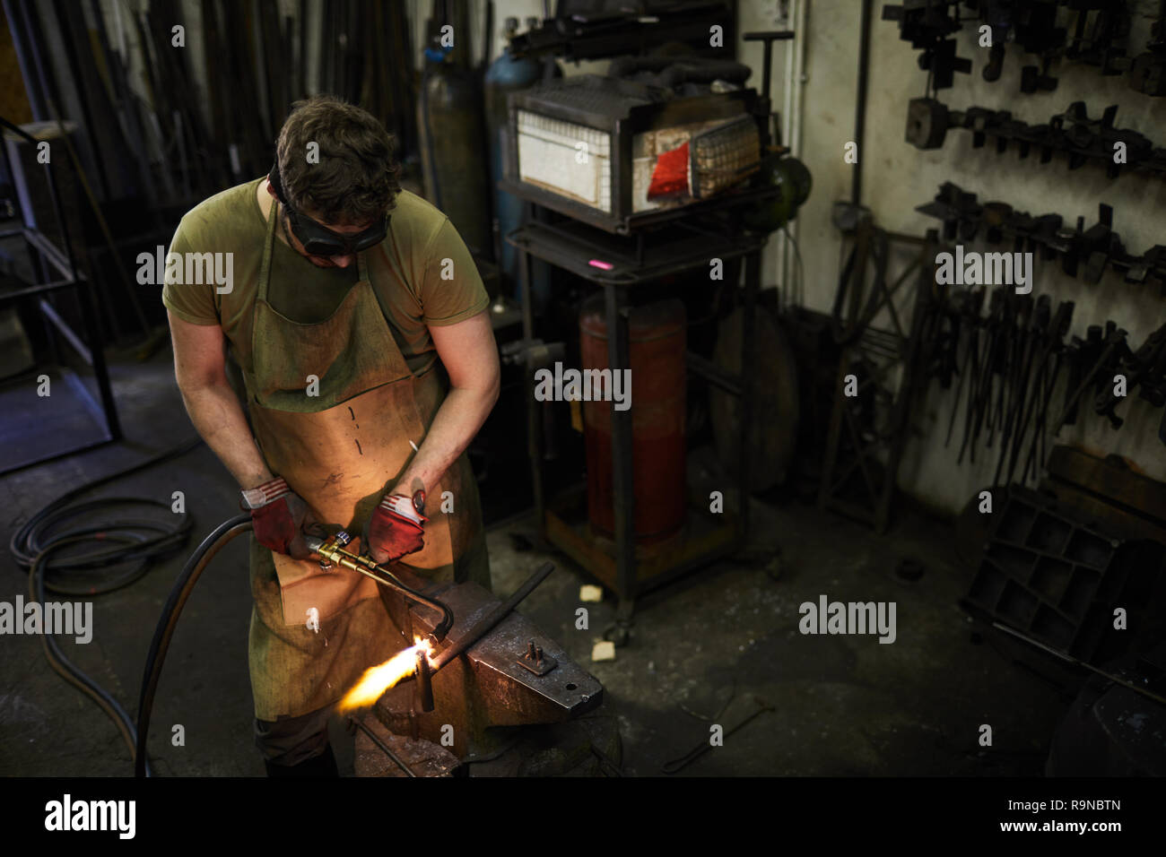 Moving torch while cutting metal Stock Photo - Alamy