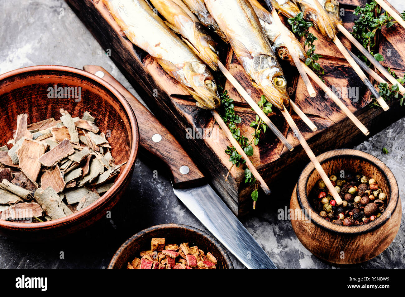 Smoked fish with spices.Cold smoked fish.Smoked capelin Stock Photo - Alamy