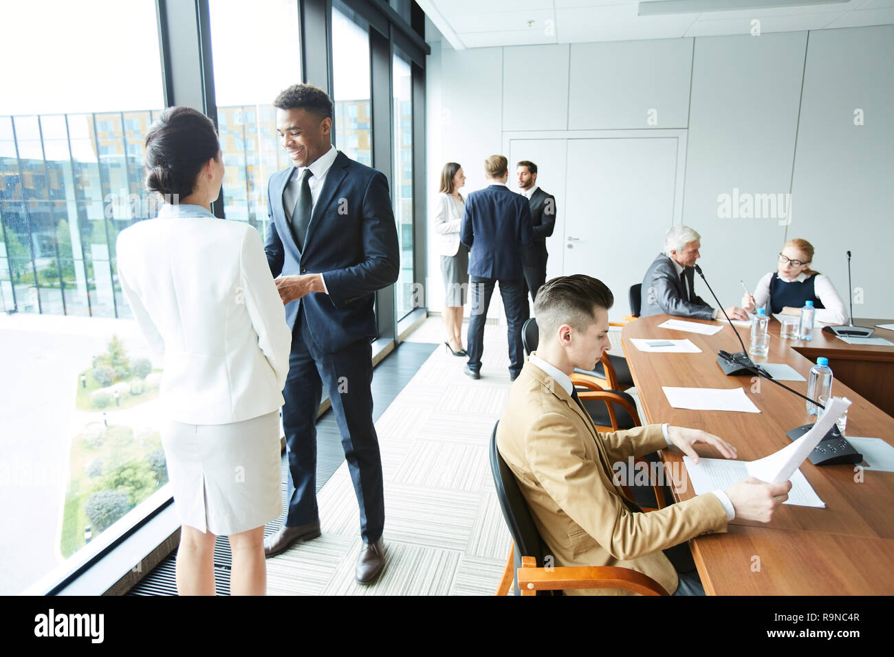 Delegates working hi-res stock photography and images - Alamy
