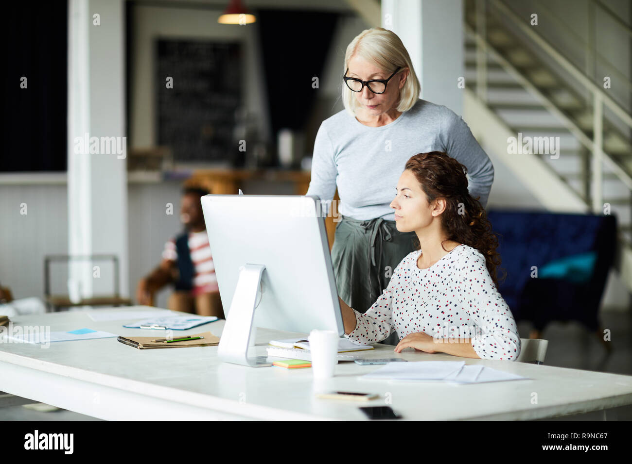 Female leader controlling the work Stock Photo - Alamy