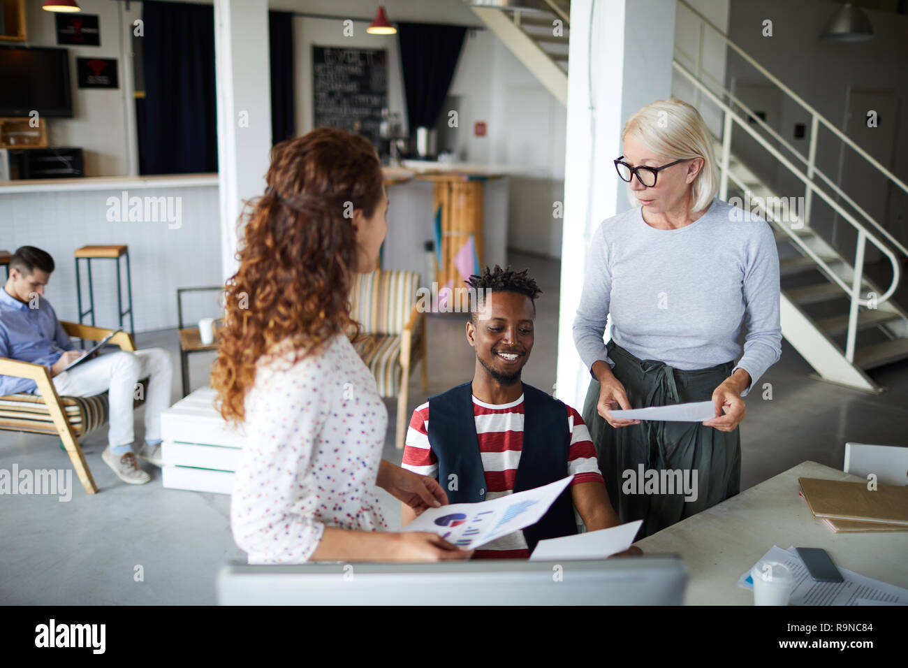 Mature man colleague working hi-res stock photography and images - Alamy