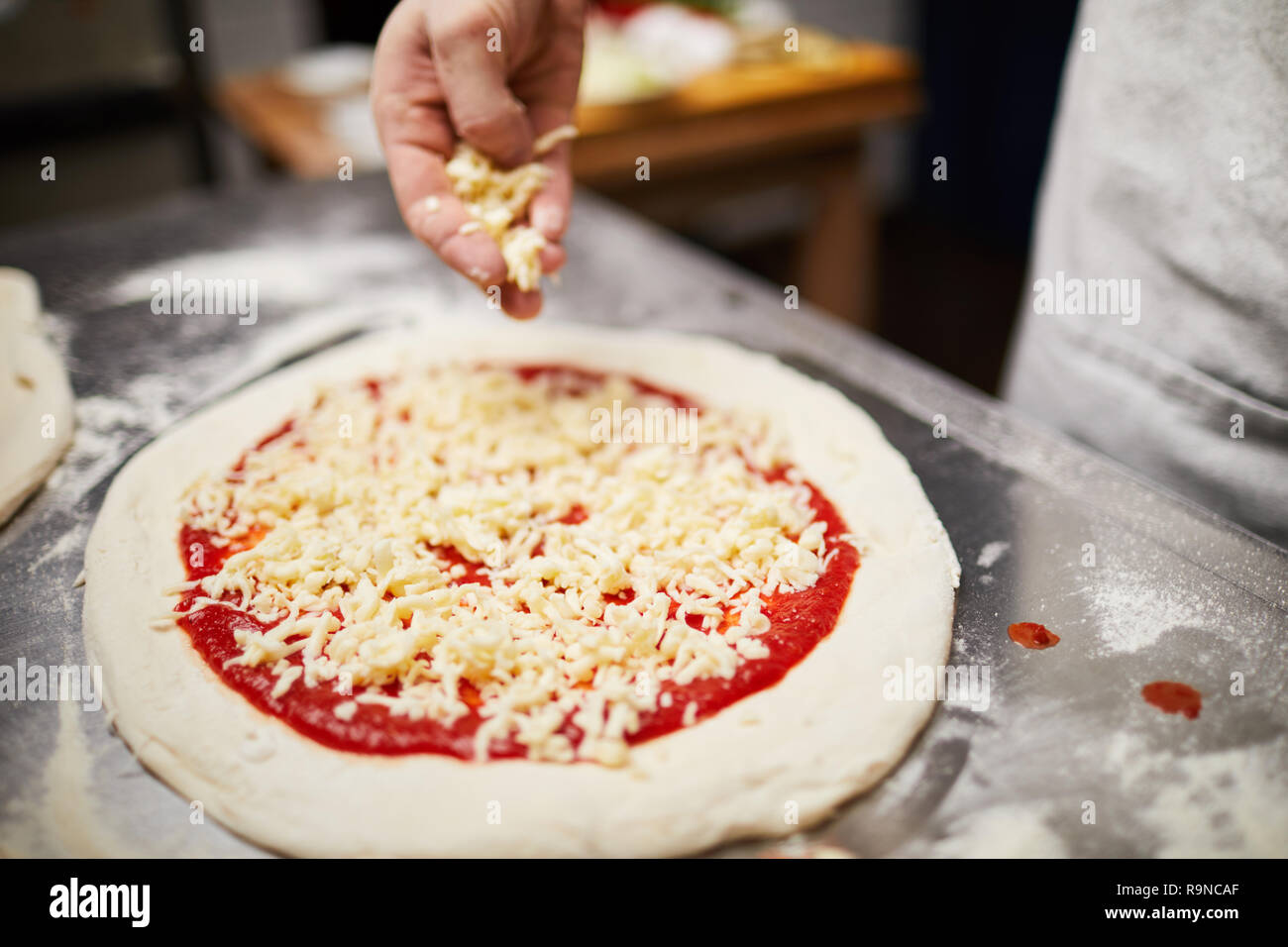 Cooking pizza dough cheese ketchup hi-res stock photography and images ...