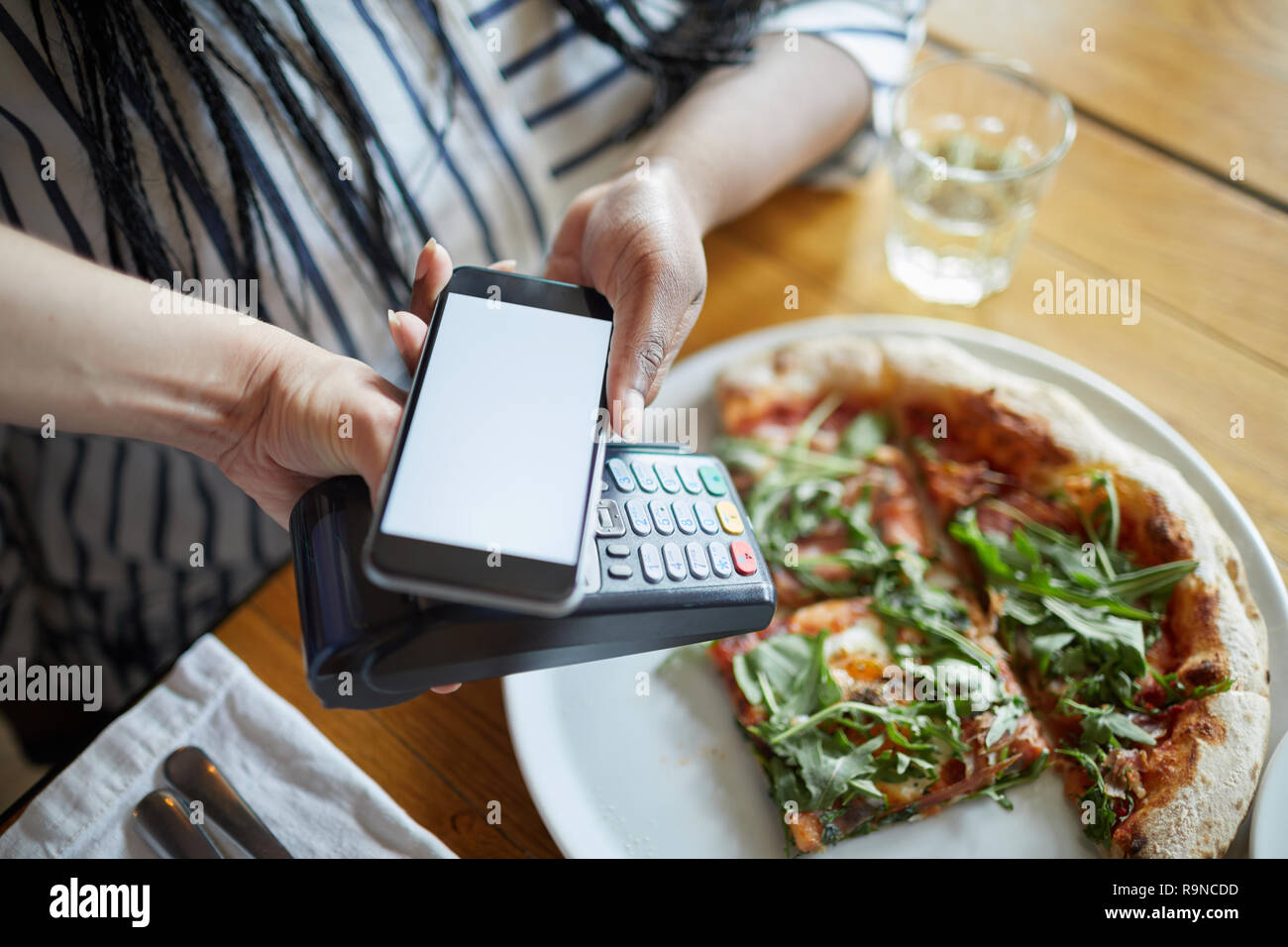 Payment for lunch Stock Photo - Alamy