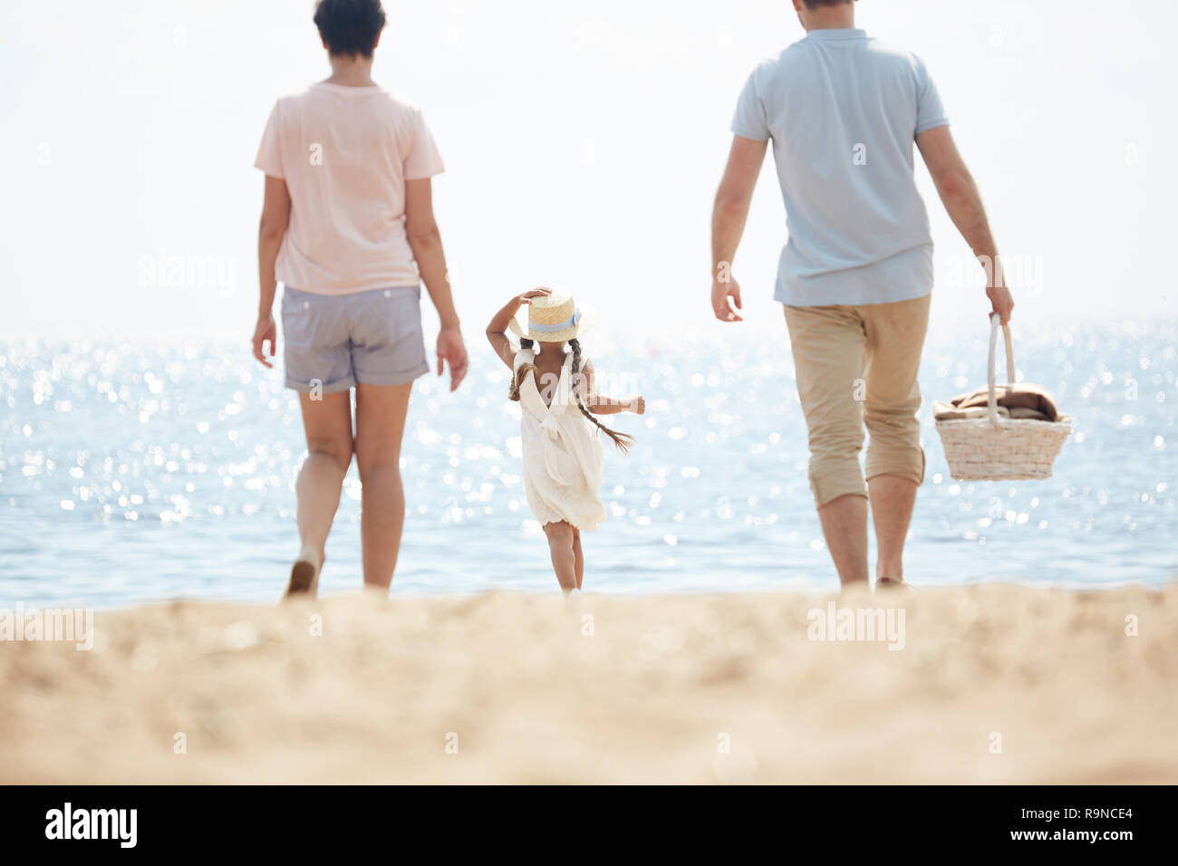 Family by seaside Stock Photo - Alamy