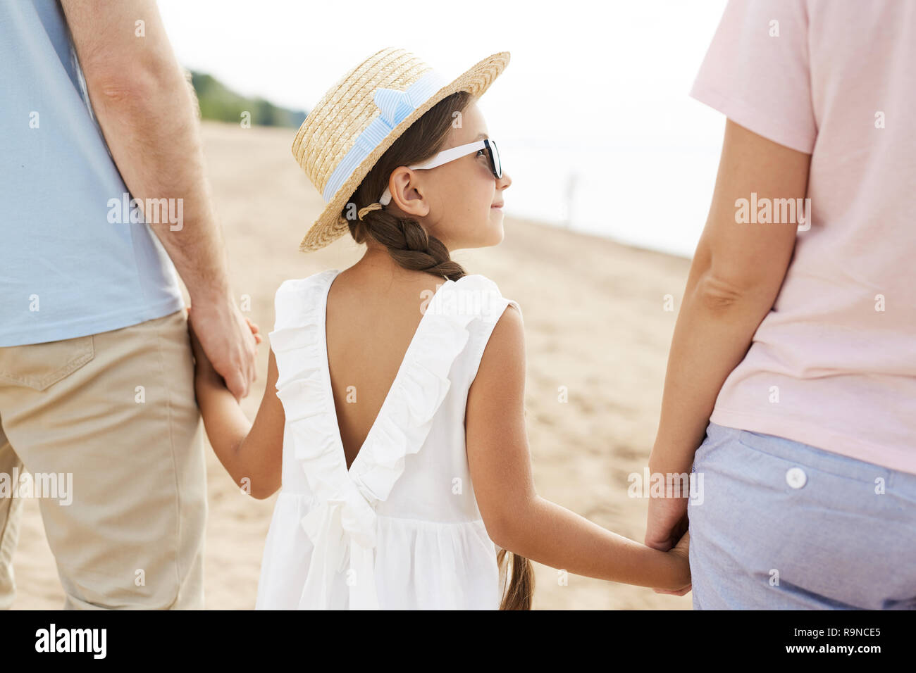 Walk with parents Stock Photo - Alamy