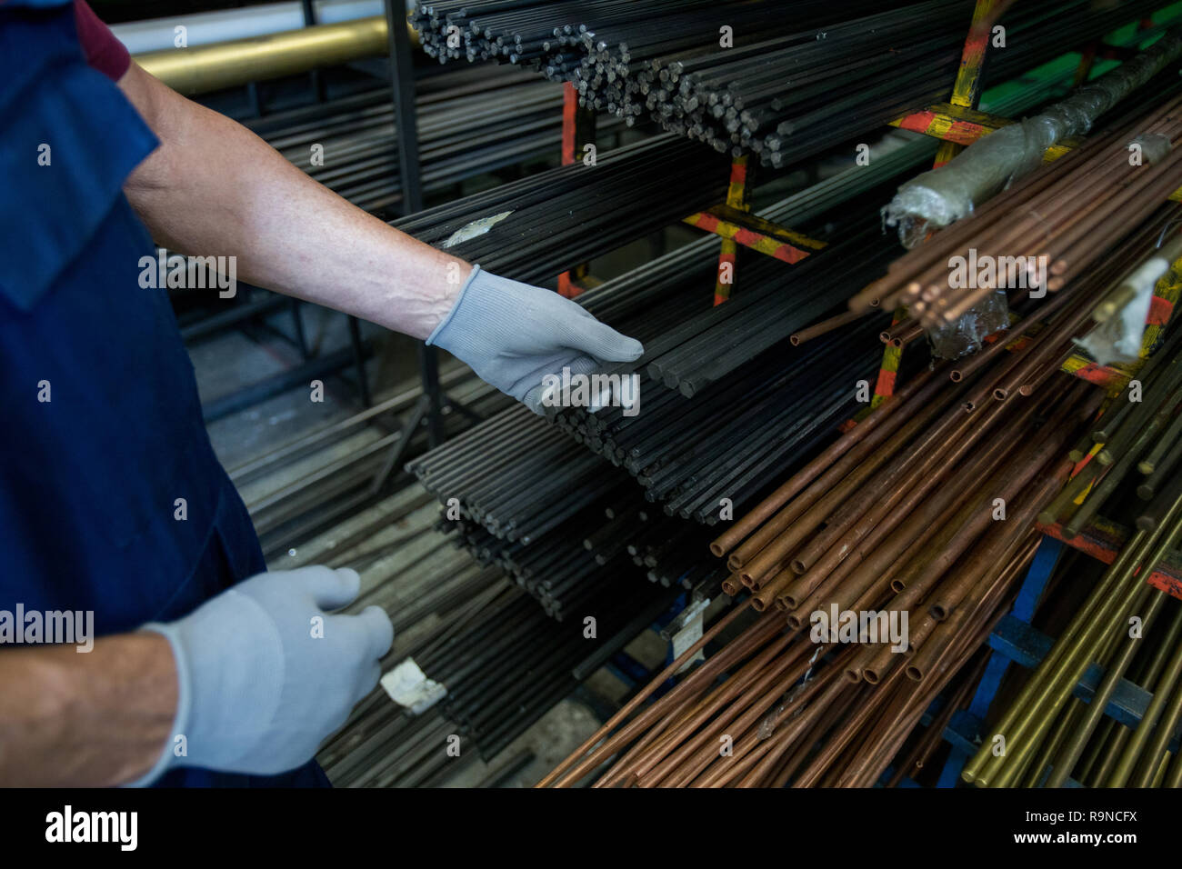 Manual worker at work Stock Photo - Alamy