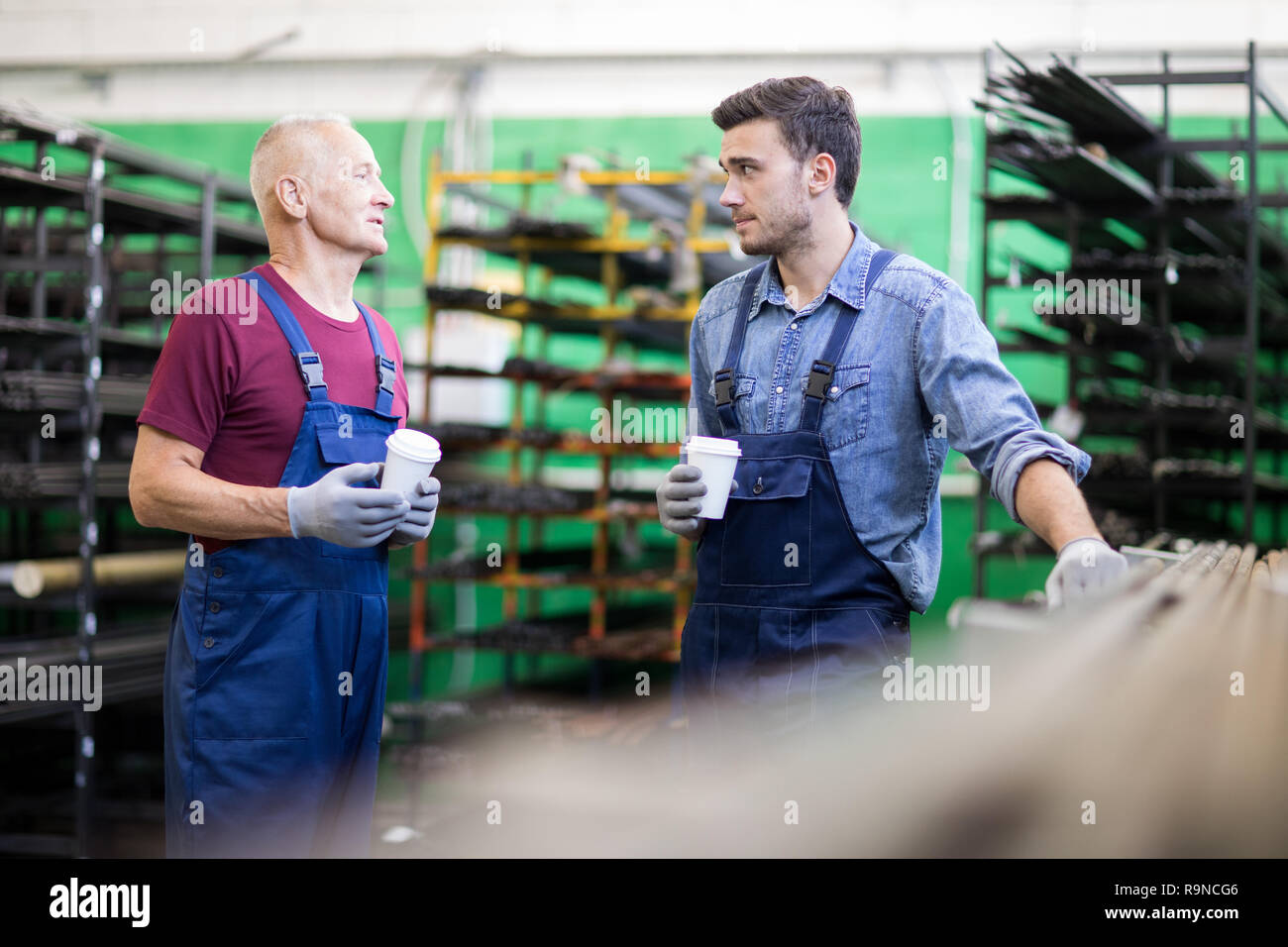 Men drinking coffee after work Stock Photo - Alamy