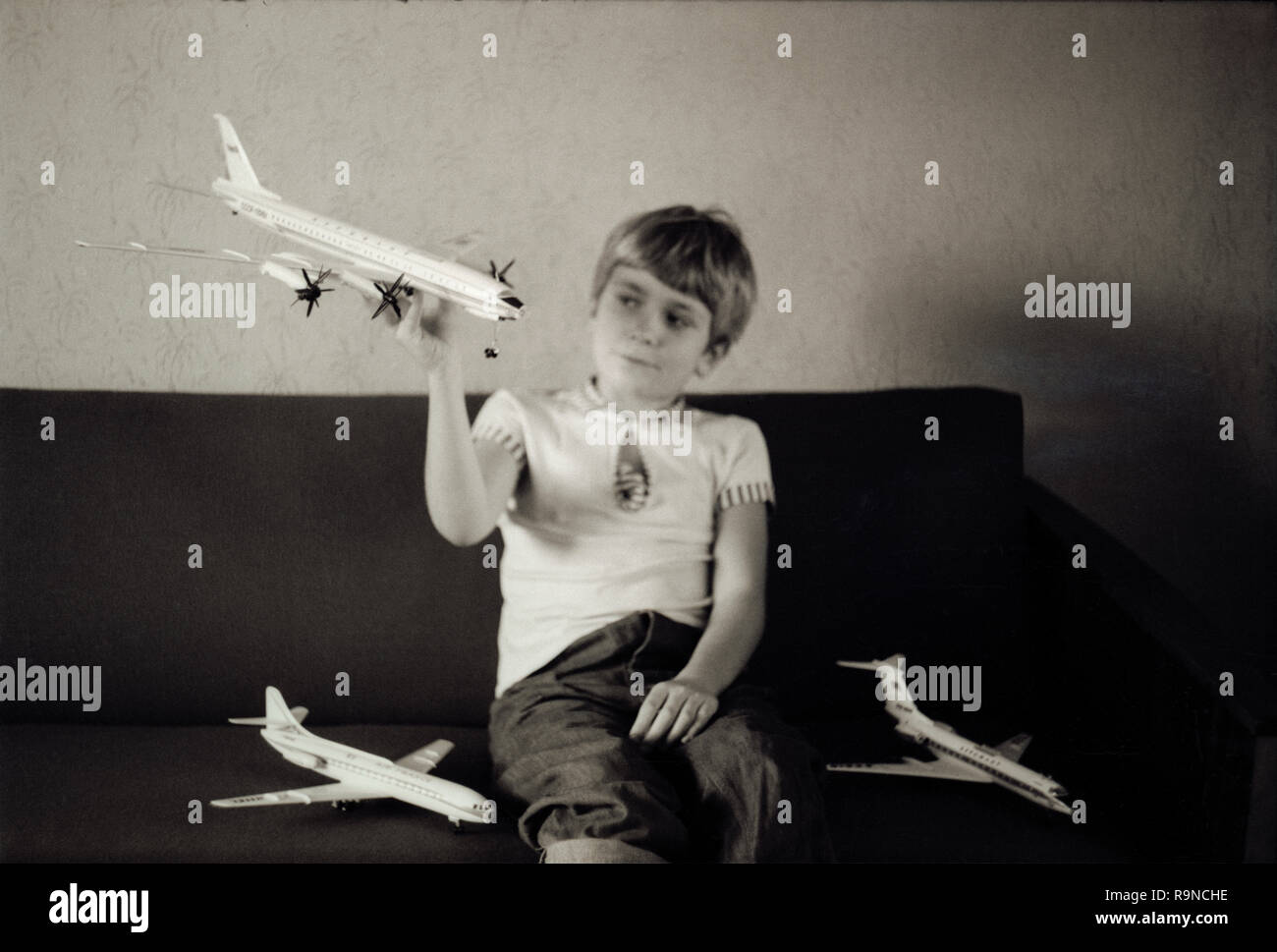 Teenage boy with model airplane hi-res stock photography and images - Alamy