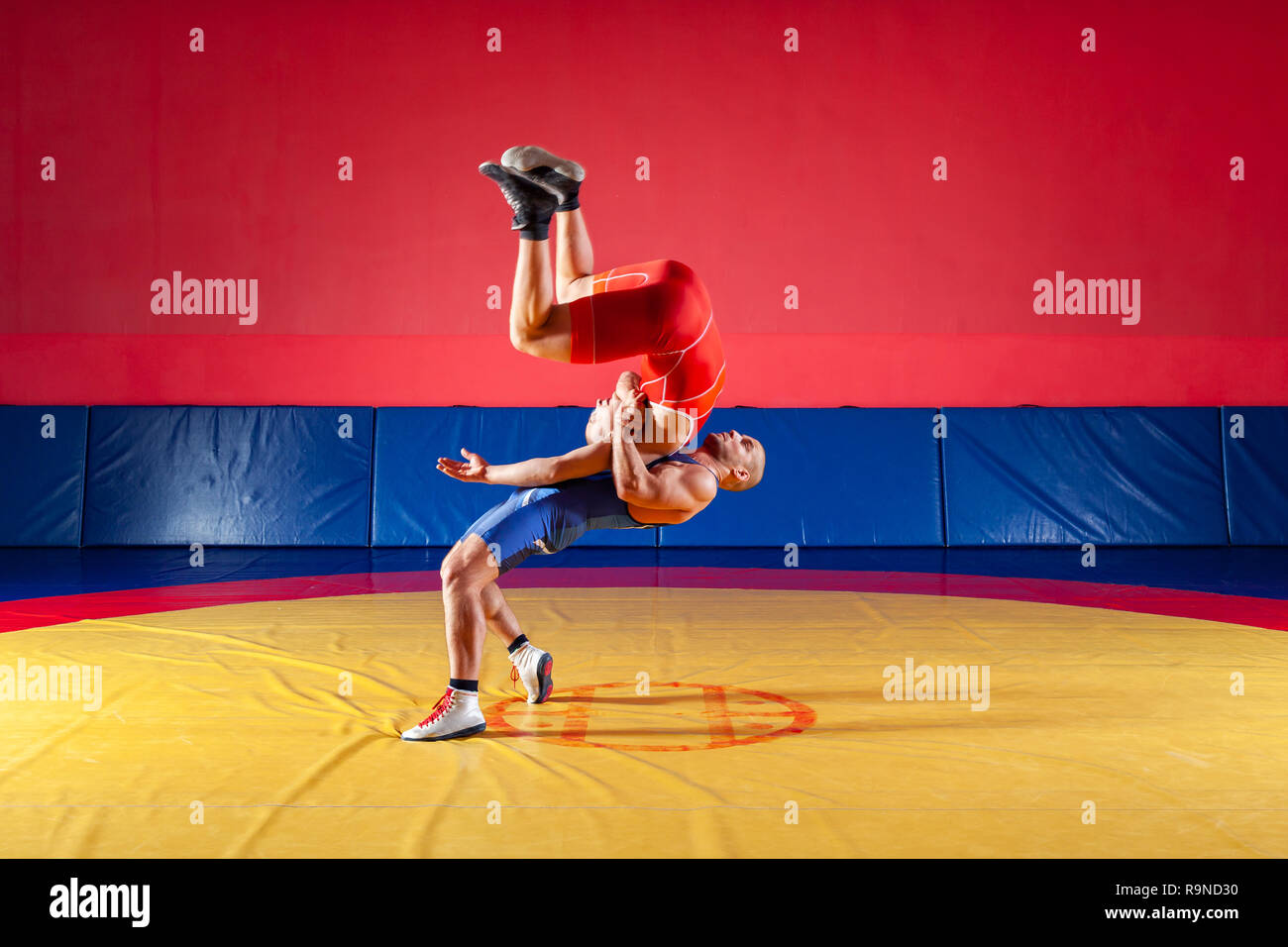 Wrestling singlets in red and blue hi-res stock photography and images ...