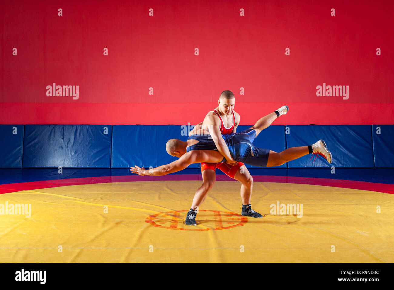 Wrestling singlets in red and blue hi-res stock photography and images ...