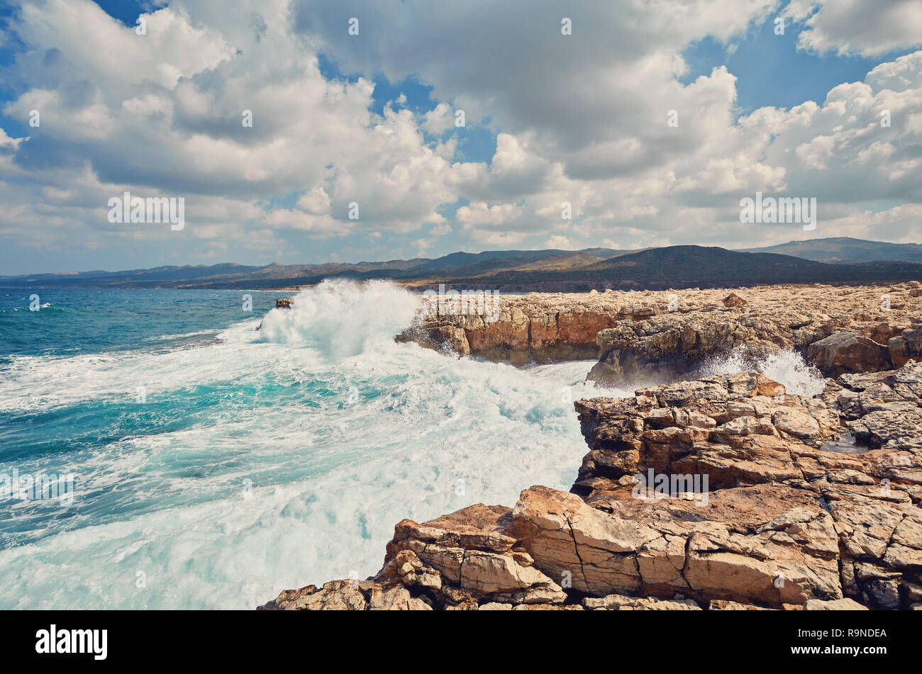 Waves beat on the rocky shore, Mediterranean Sea. Cyprus Stock Photo ...