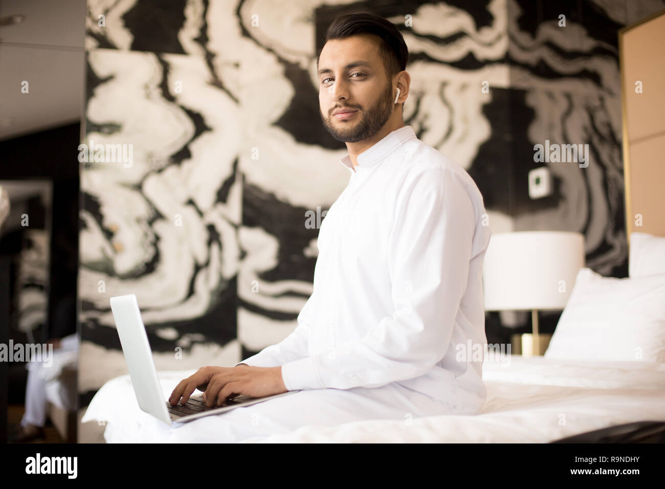 Young confident man typing hi-res stock photography and images - Alamy