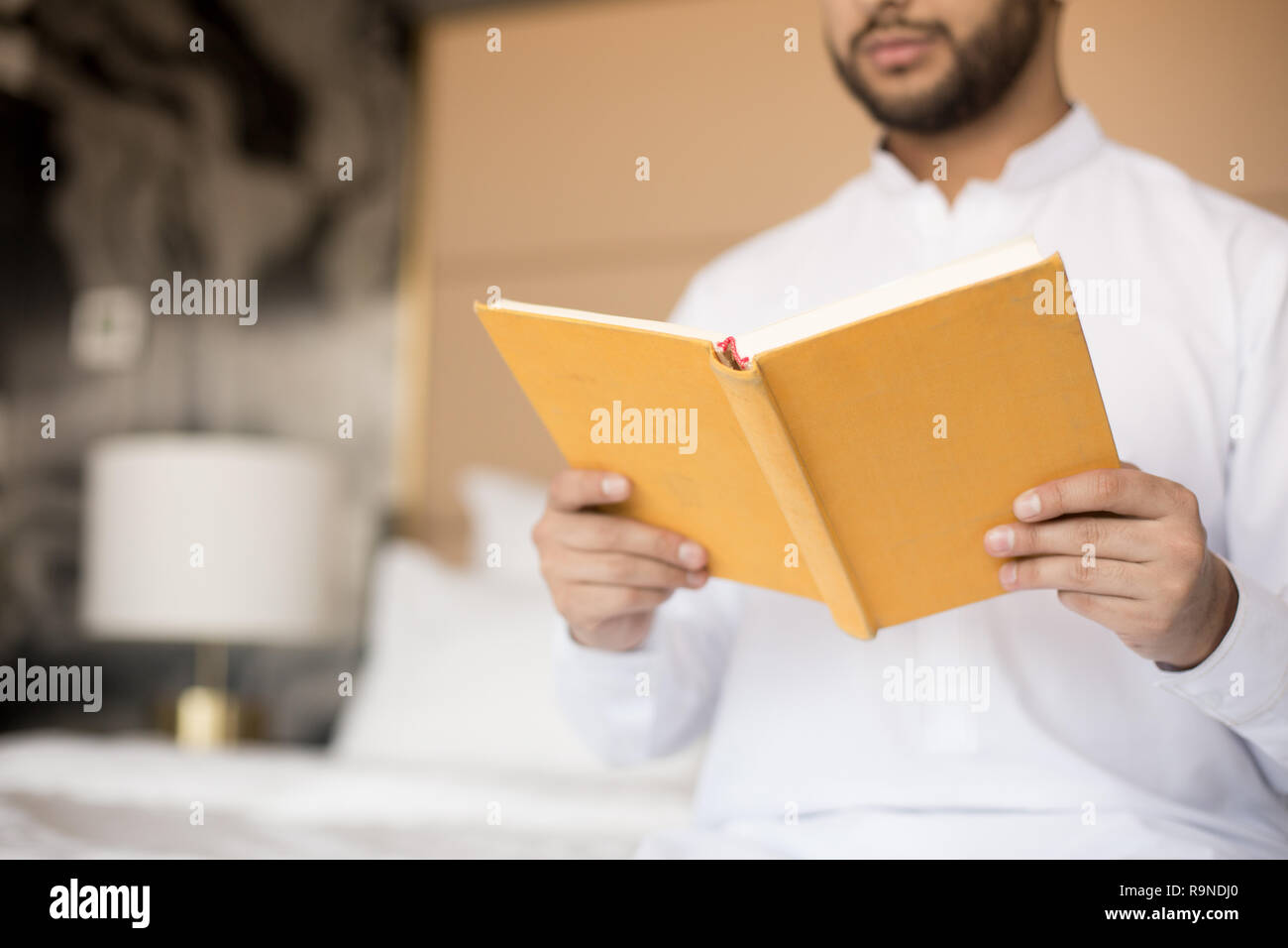 Man reading book Stock Photo - Alamy