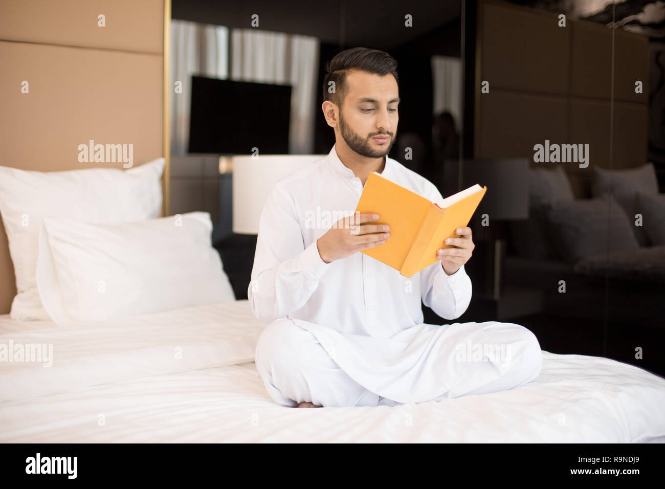 Professional man with book hi-res stock photography and images - Alamy